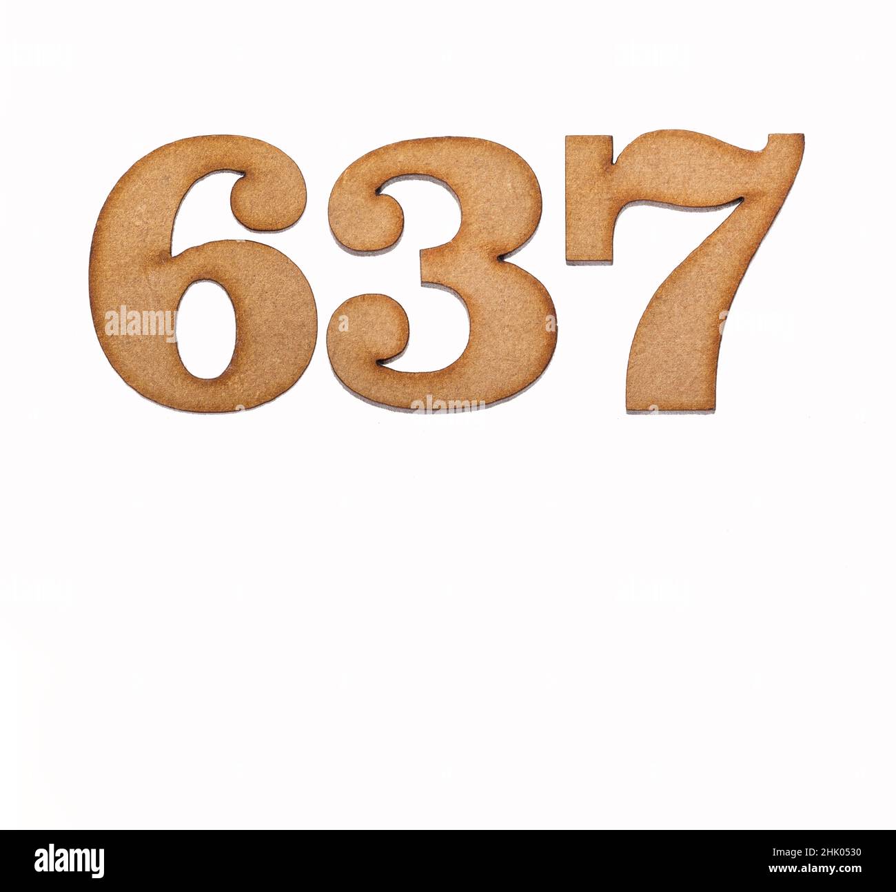 Number 637 in wood, isolated on white background Stock Photo - Alamy
