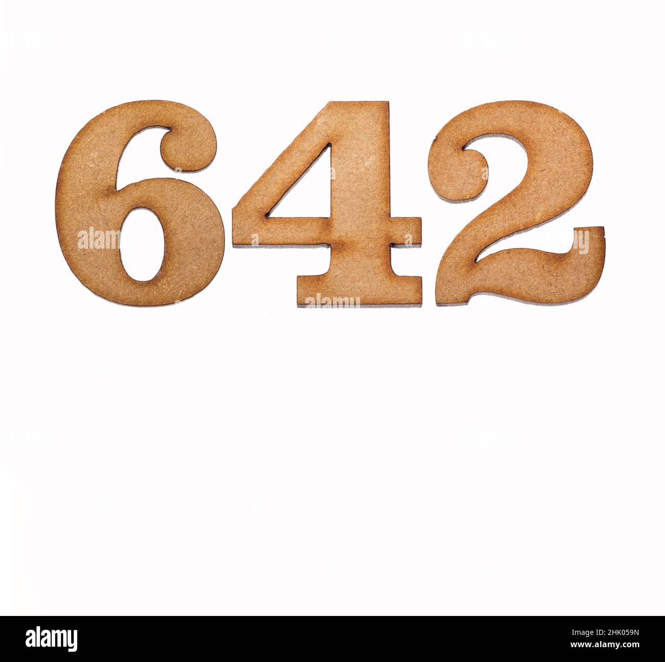 Number 642 - Piece of wood isolated on white background Stock Photo - Alamy