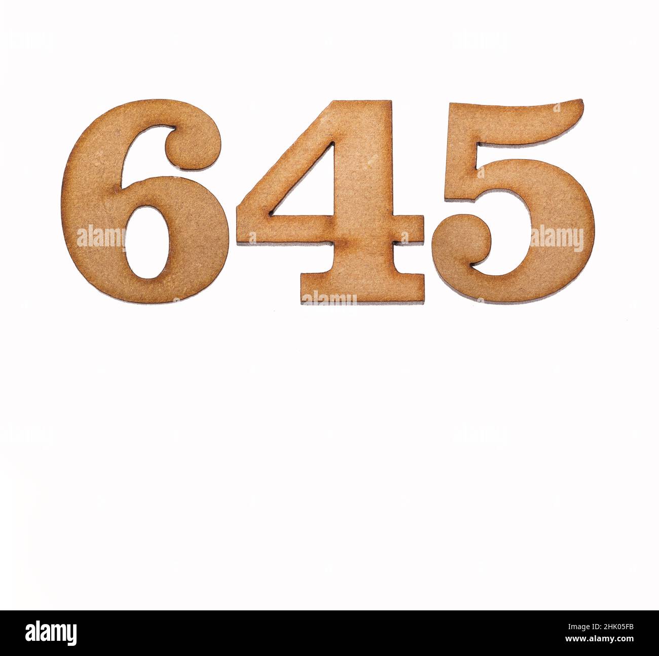 Number 645 in wood, isolated on white background Stock Photo - Alamy