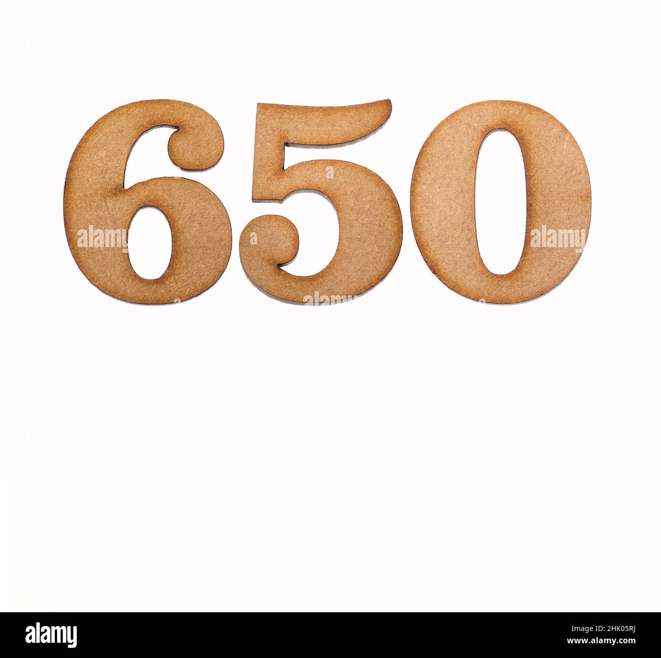 Number 650 - Piece of wood isolated on white background Stock Photo - Alamy