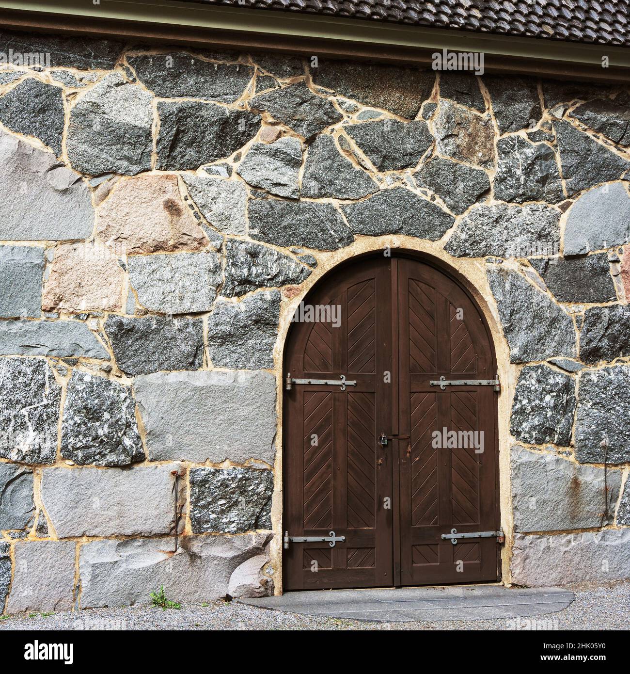 Wooden door to medieval stone church of Lammi Finland Stock Photo - Alamy