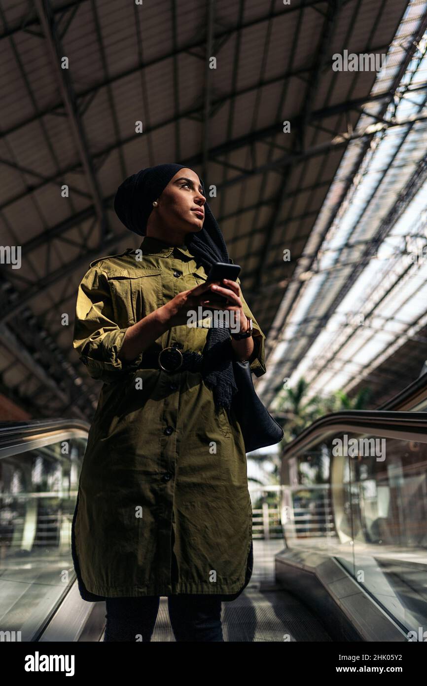 Bussiness muslim woman on a train station Stock Photo - Alamy