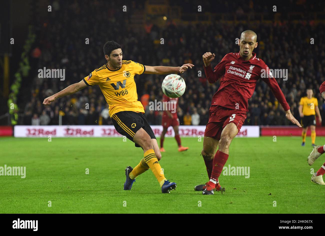 Wolves footballer Raul Jimenez and Fabinho of Liverpool. Wolverhampton ...