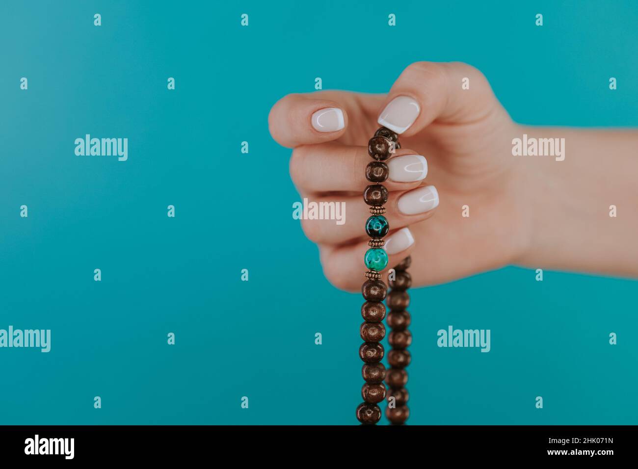 Hand and japa mala prayer beads hi-res stock photography and images - Alamy