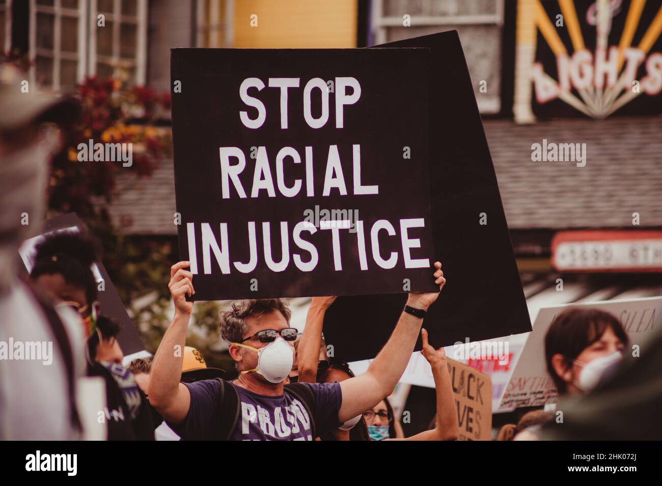 People walking at a Black Lives Matter march Stock Photo - Alamy