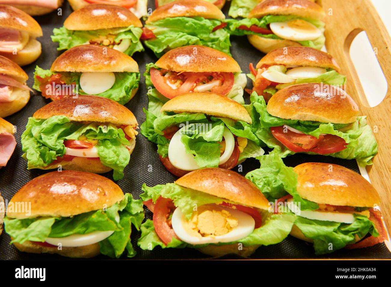 vegetable bread roll with tomato, lettuce and egg Stock Photo - Alamy