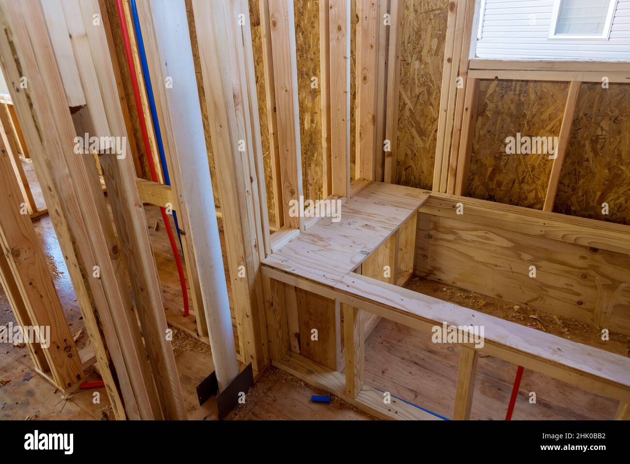 New framing stick built building of beams on new home under ...