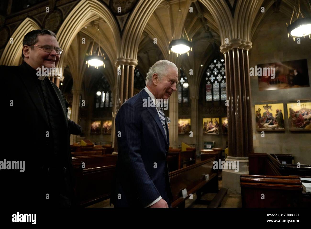 The Prince of Wales (right) with Father Dominic Robinson, the church's ...
