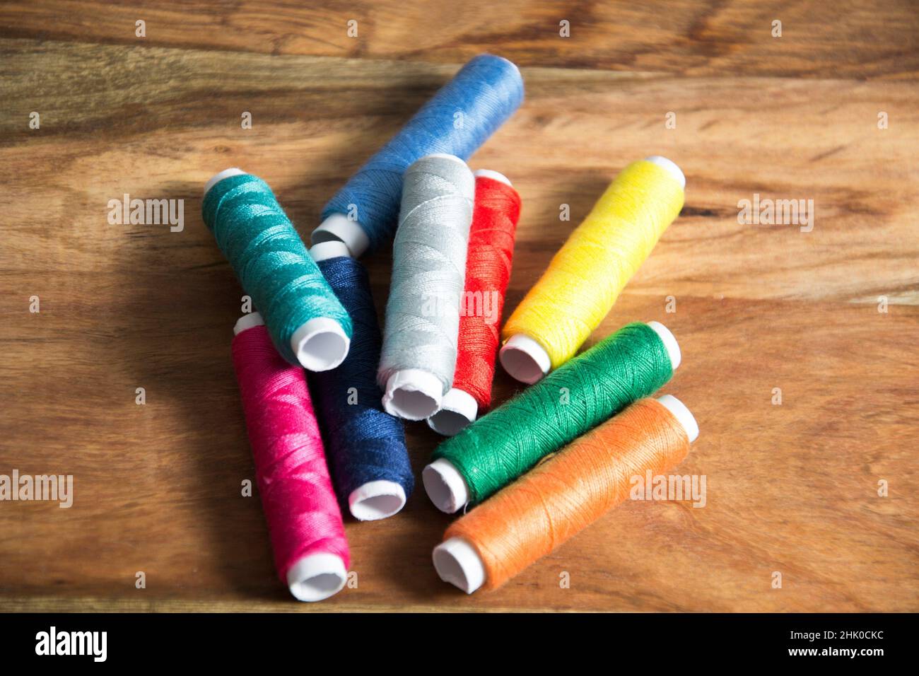 colorful sewing thread Stock Photo - Alamy