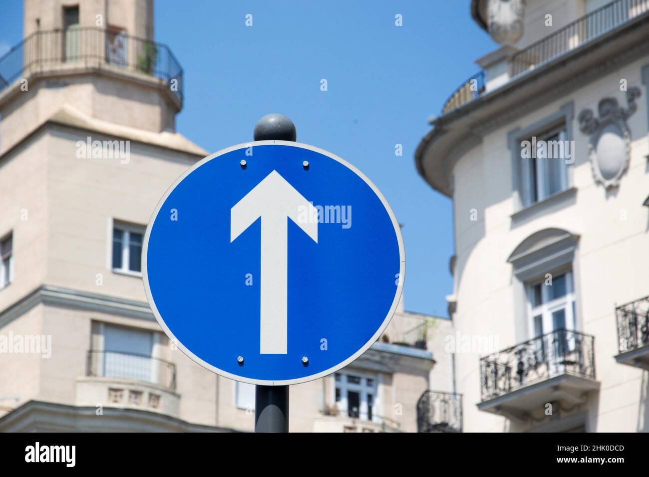 Blue one way sign hi-res stock photography and images - Alamy