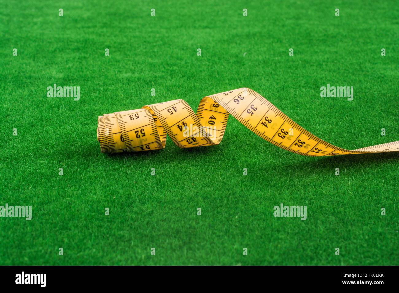 Measure tape grass hi-res stock photography and images - Alamy
