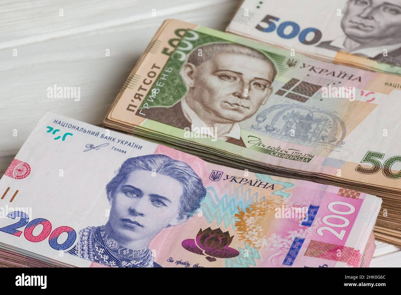 Money of Ukraine. Stack of ukrainian hryvnia banknotes in hands on ...