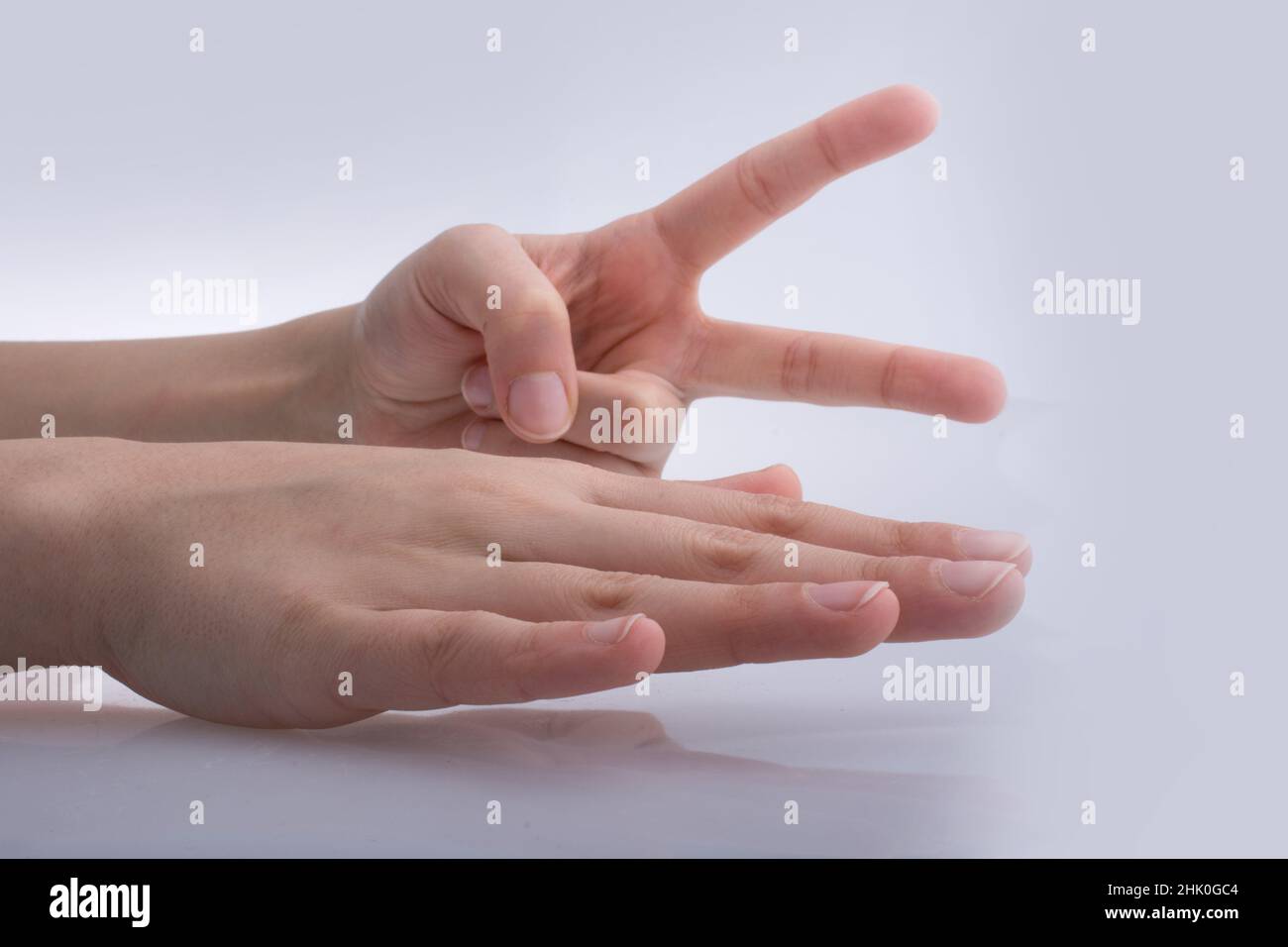 Hands rock paper scissors hi-res stock photography and images - Alamy