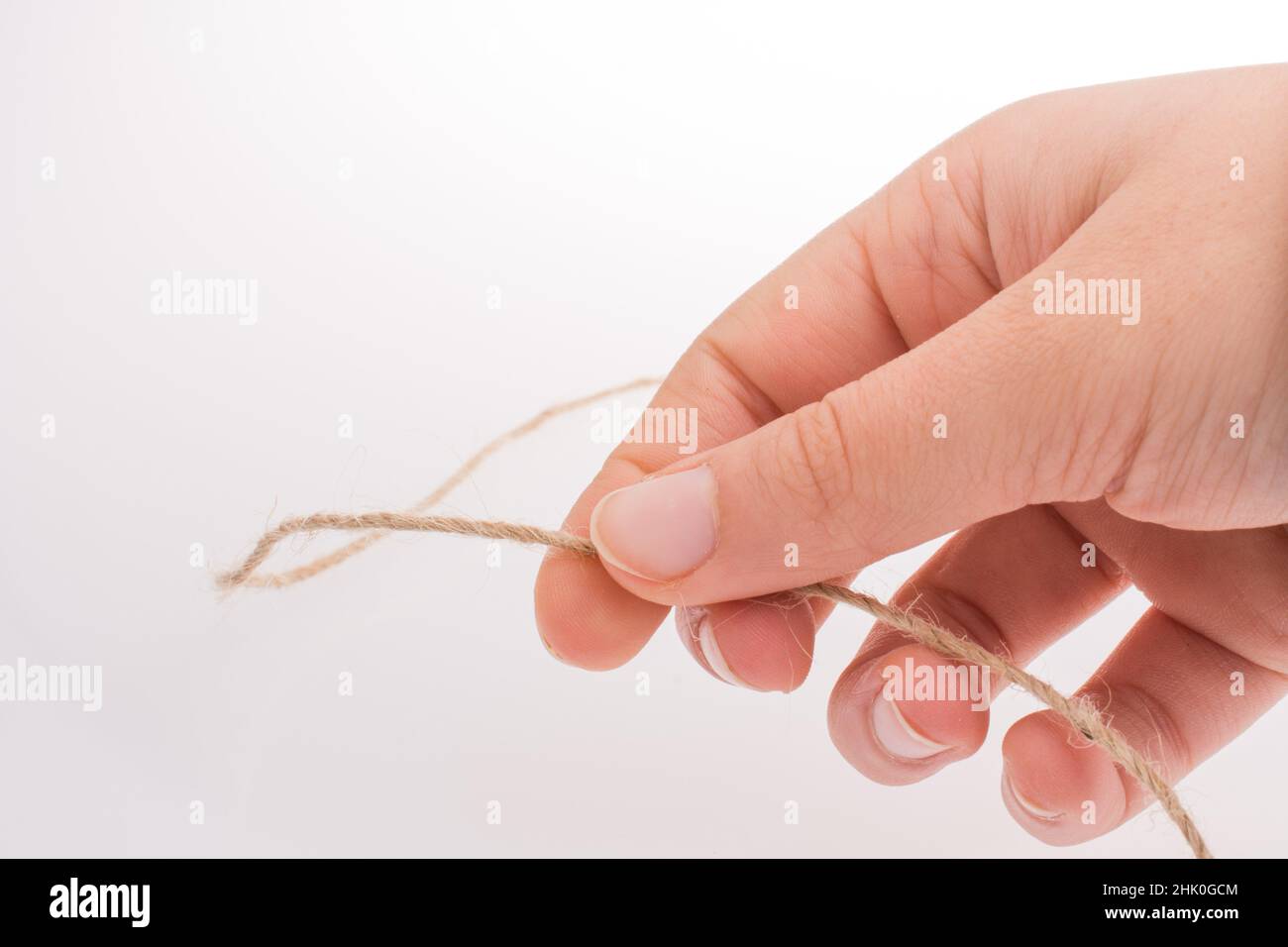 Thread holding needle hi-res stock photography and images - Alamy
