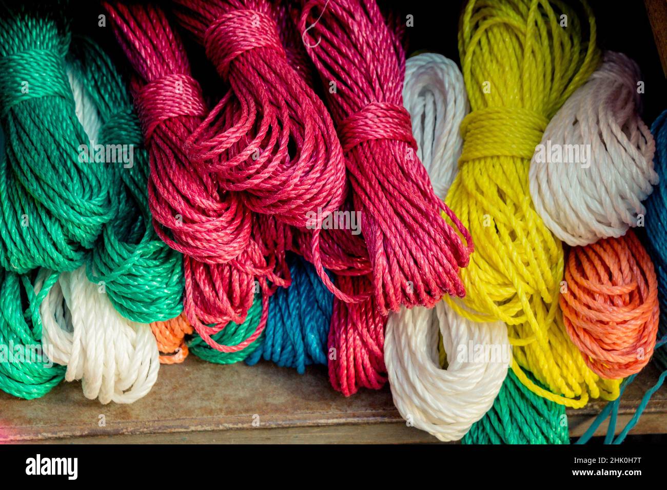 Bundle of colorfulrope in view in a market place Stock Photo - Alamy