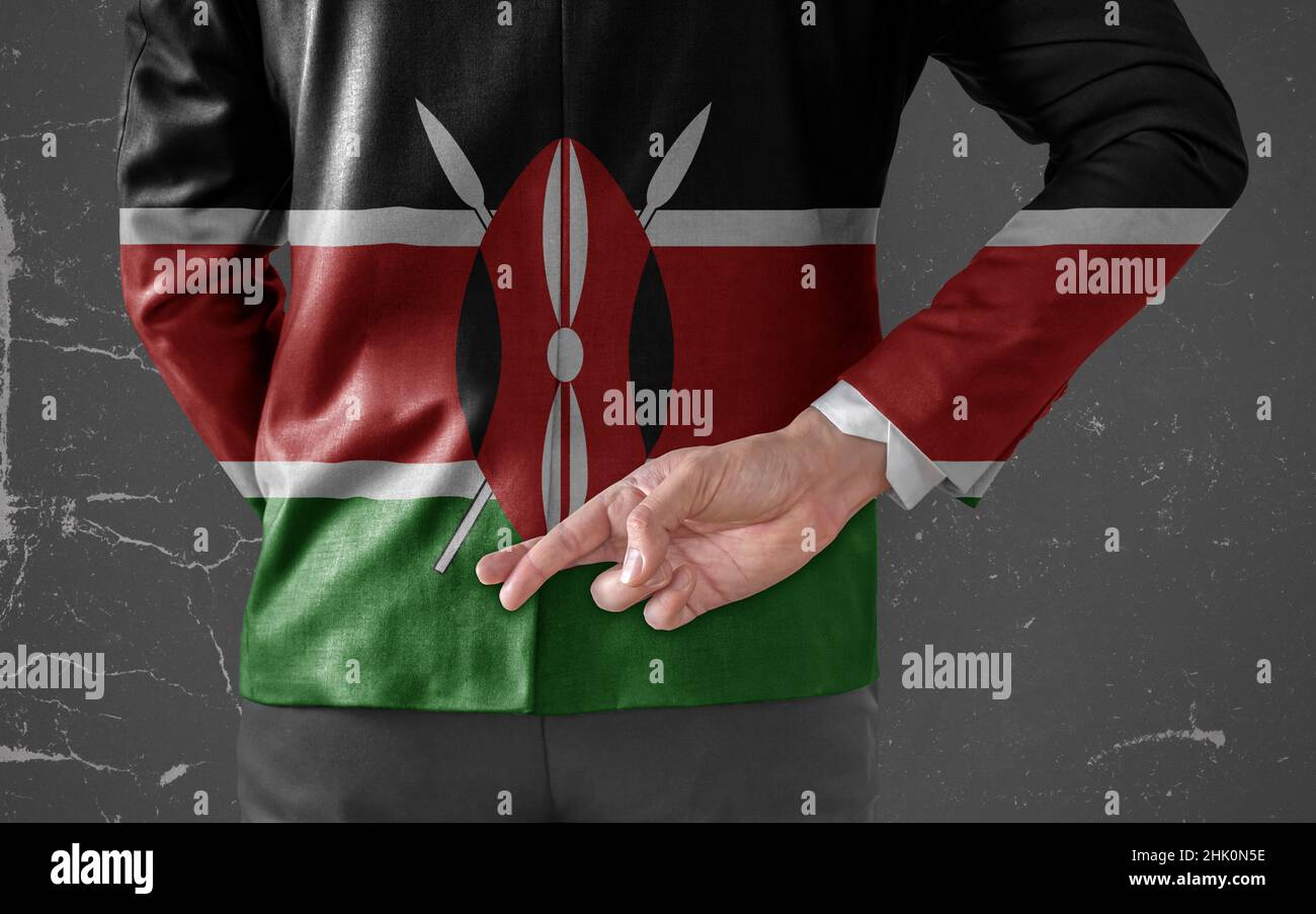 Businessman Jacket with Flag of Kenya with his fingers crossed behind ...
