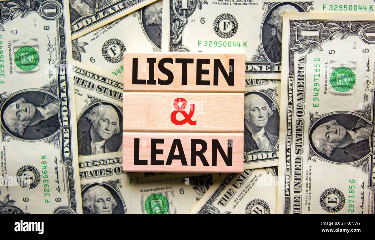 Listen and learn symbol. Concept words Listen and learn on wooden ...