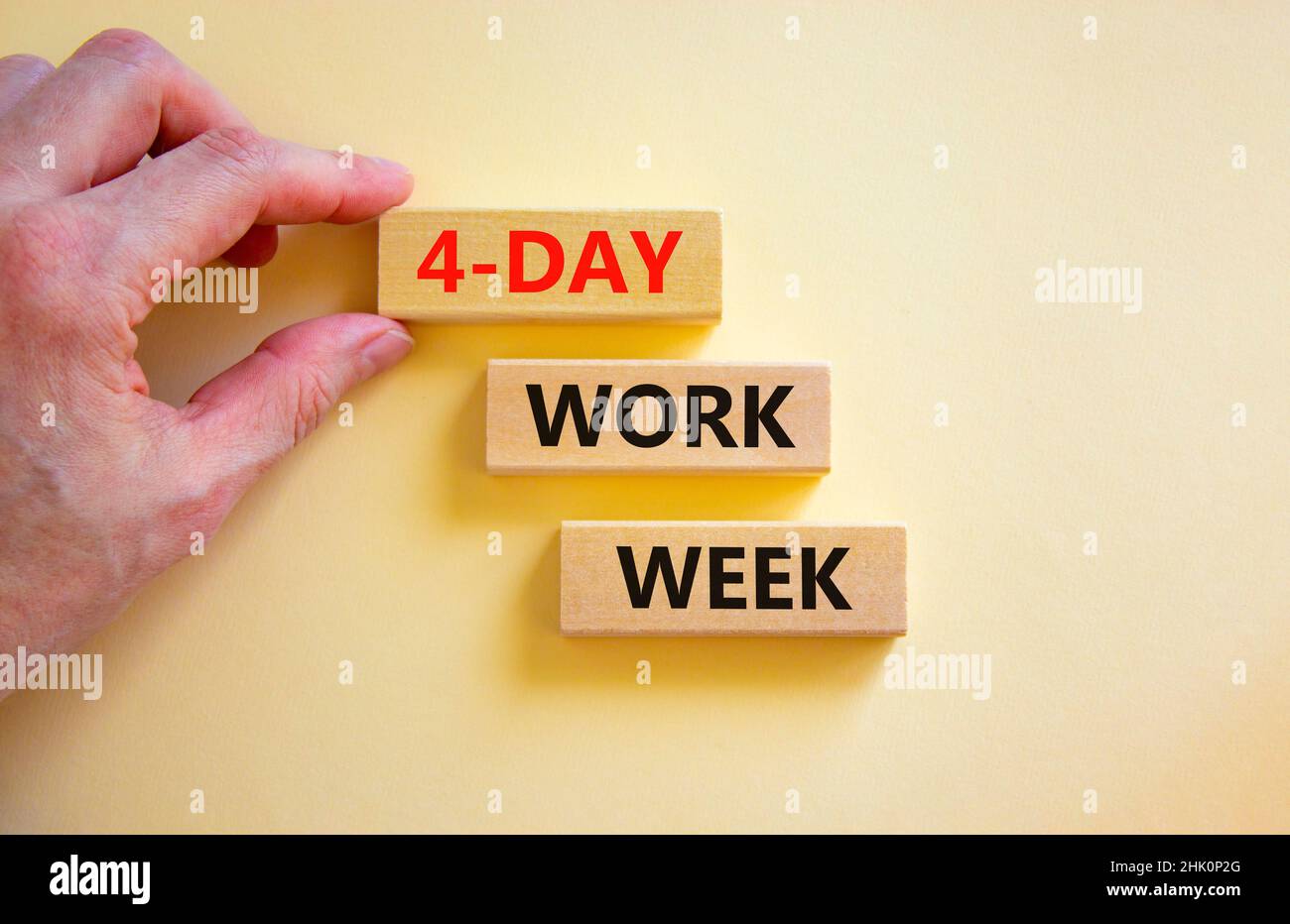 4-day work week symbol. Concept words 4-day work week on wooden blocks ...