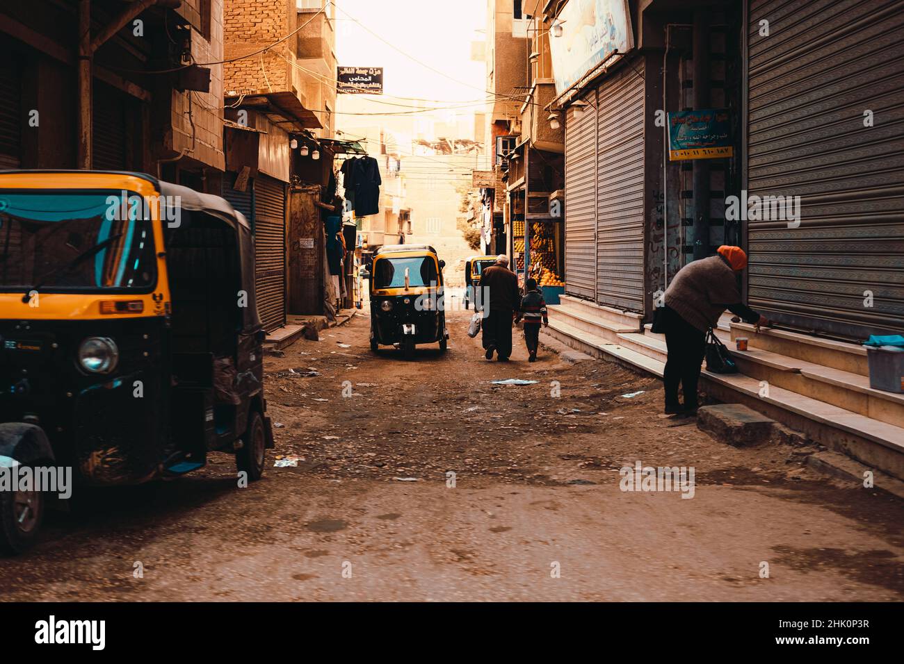 Cairo Egypt January 2022 Several tuk tuk rikshaws on a small street in ...