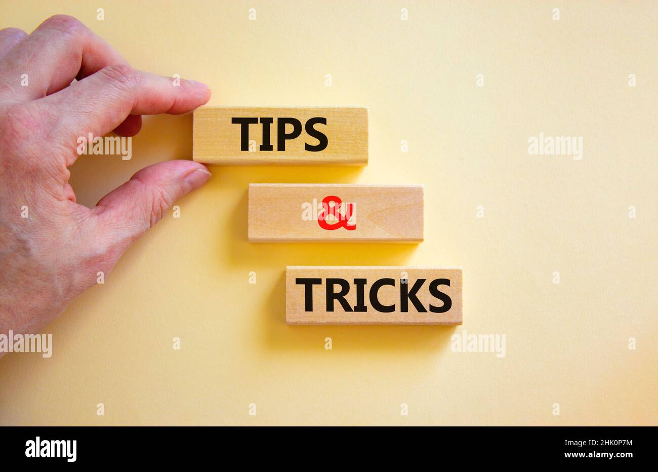 Tips and tricks symbol. Concept words Tips and tricks on wooden blocks ...