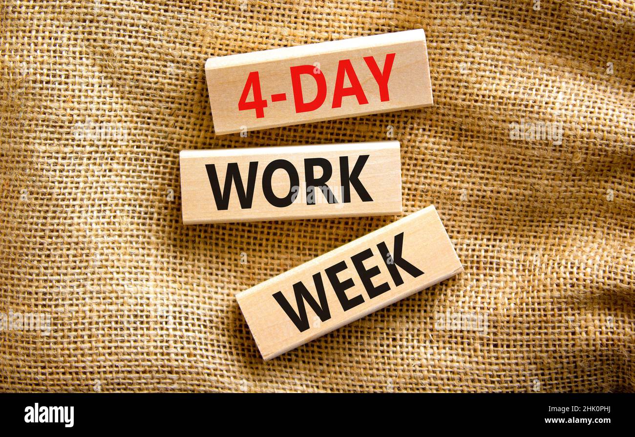 4-day work week symbol. Concept words 4-day work week on wooden blocks ...