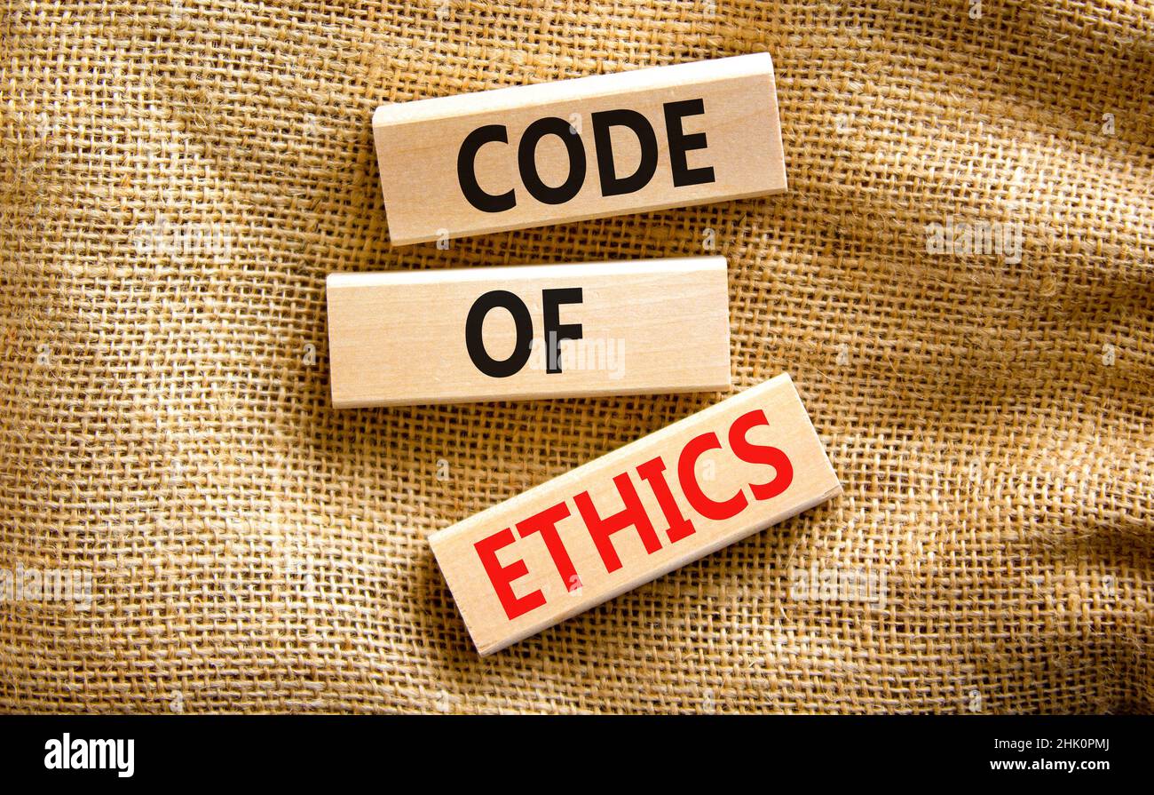 Code of ethics symbol. Concept words Code of ethics on wooden blocks on ...