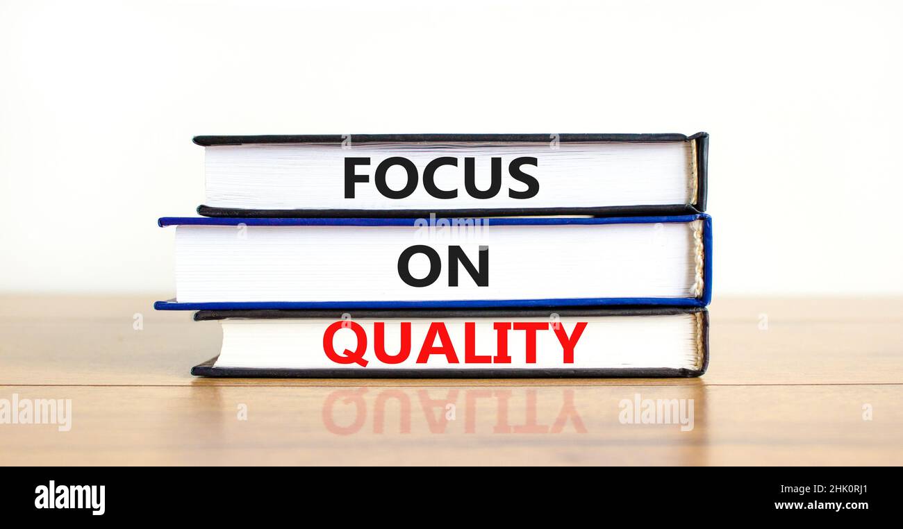 Focus on quality symbol. Concept words Focus on quality on books on ...
