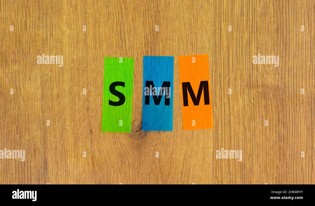 SMM, social media marketing symbol. Concept word SMM social media marketing colored papers on ...
