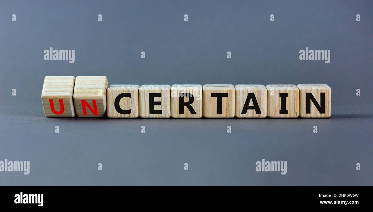 Certain or uncertain symbol. Turned wooden cubes and changed the ...