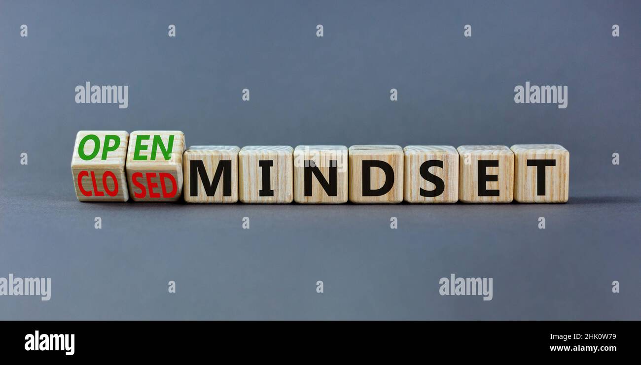 Open or closed mindset symbol. Turned wooden cubes and changed concept ...