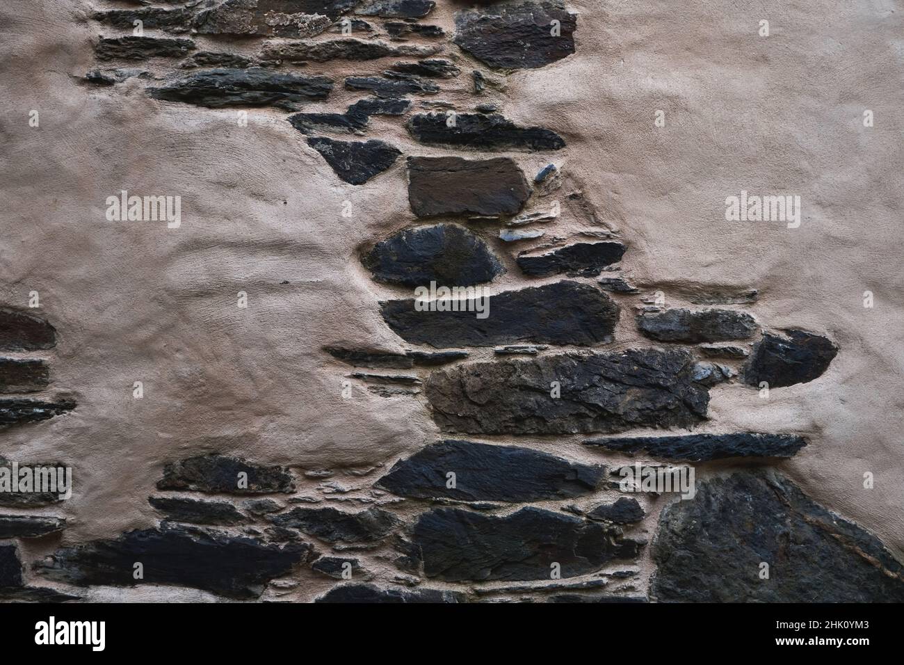 Old traditional stonework wall with plaster finish Stock Photo - Alamy