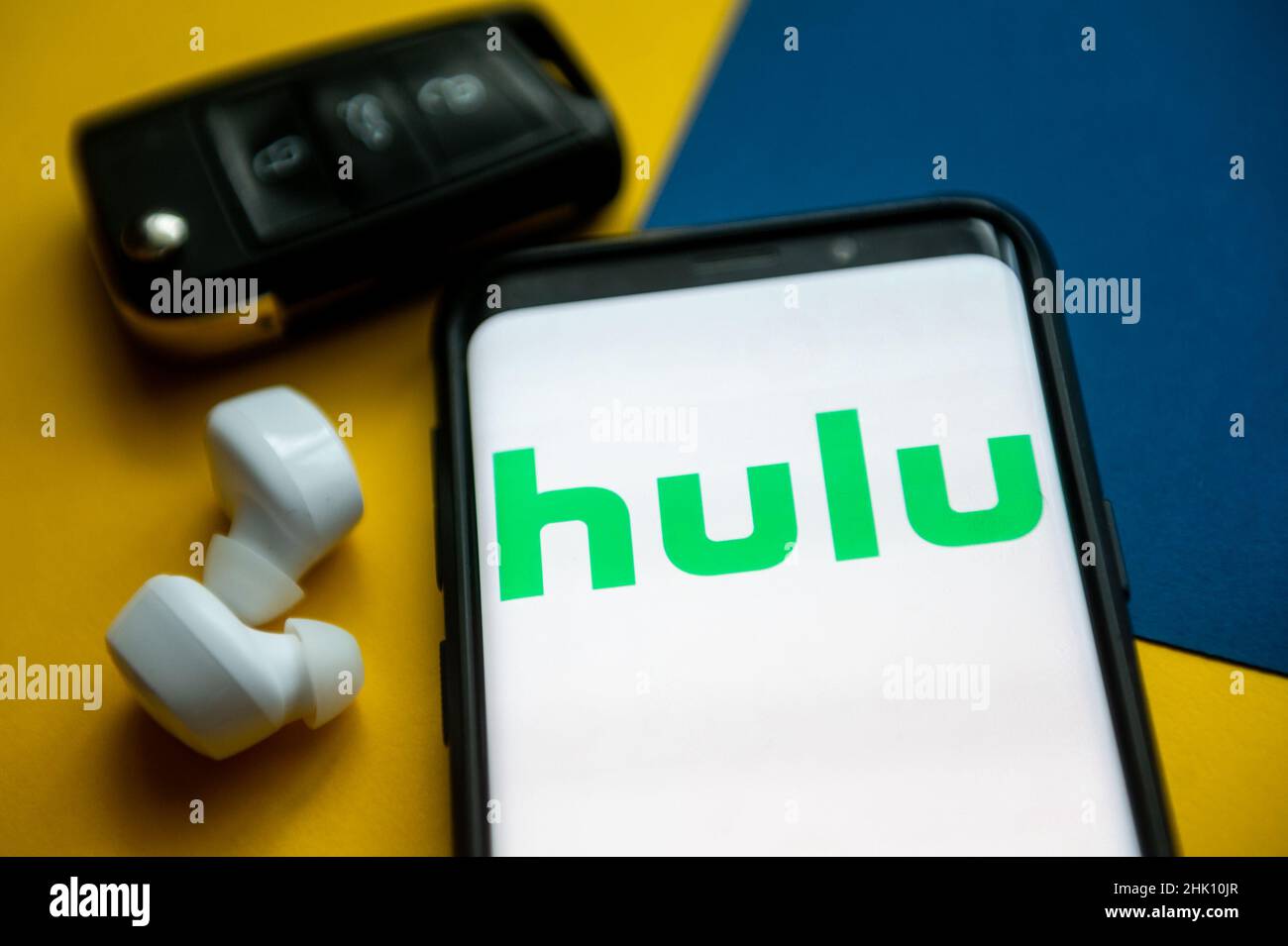 In this photo illustration a Hulu logo seen displayed on a smartphone ...