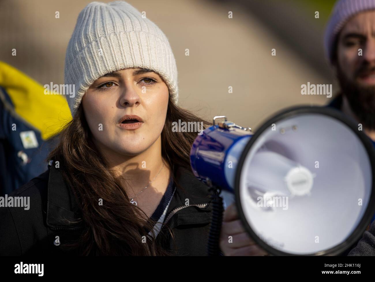 Youth activist Jenny Steele speaking to a gathered crowd of climate ...