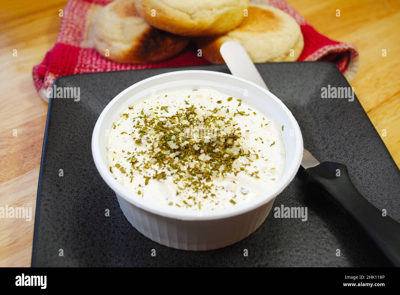 Creamy Spreadable Cheese Made with Garlic and Herbs Stock Photo - Alamy