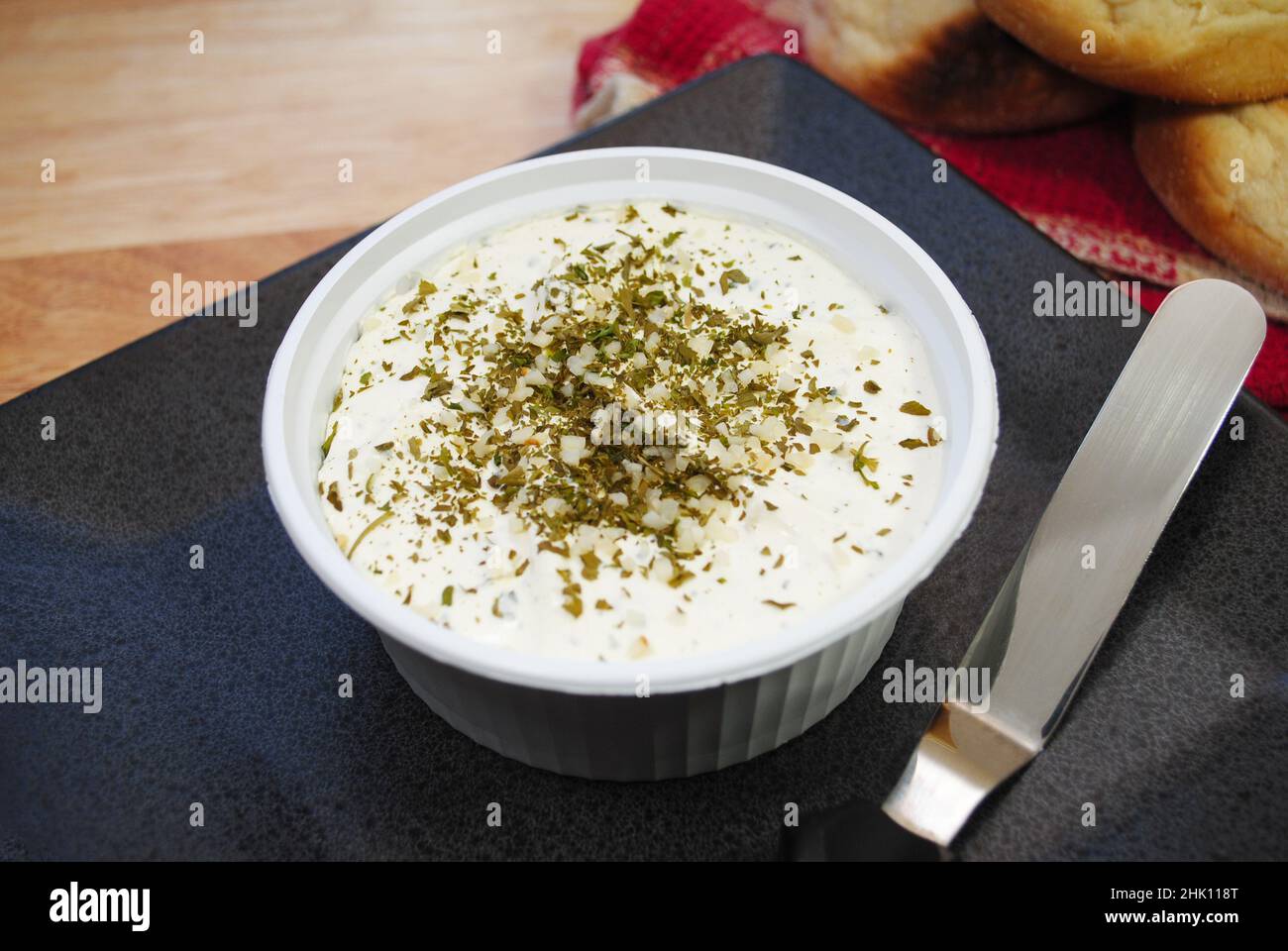 Creamy Spreadable Cheese Made with Garlic and Herbs Stock Photo - Alamy