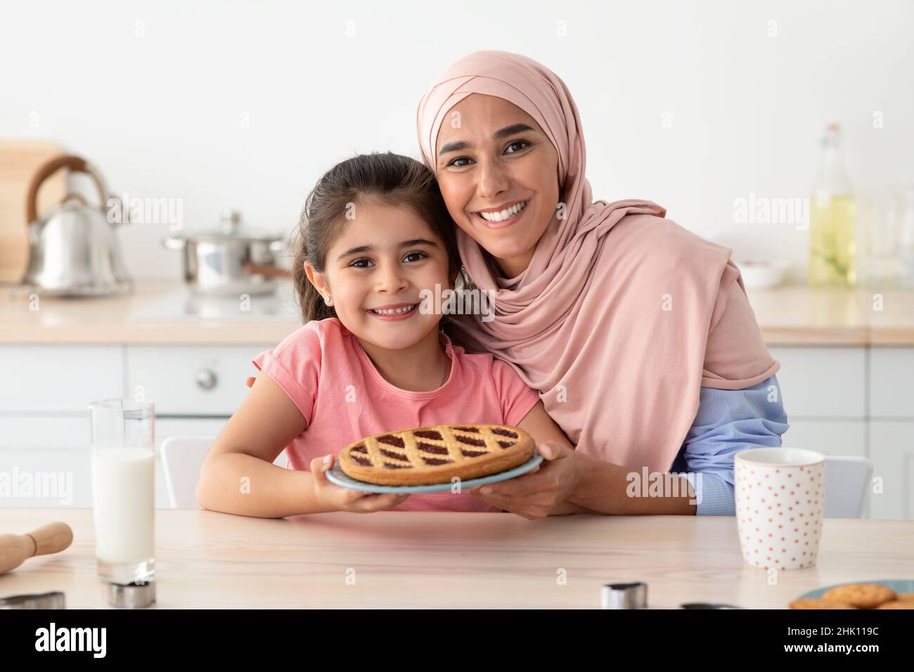 Baking Together. Portrait Of Happy Arabic Mother And Daughter Holding ...
