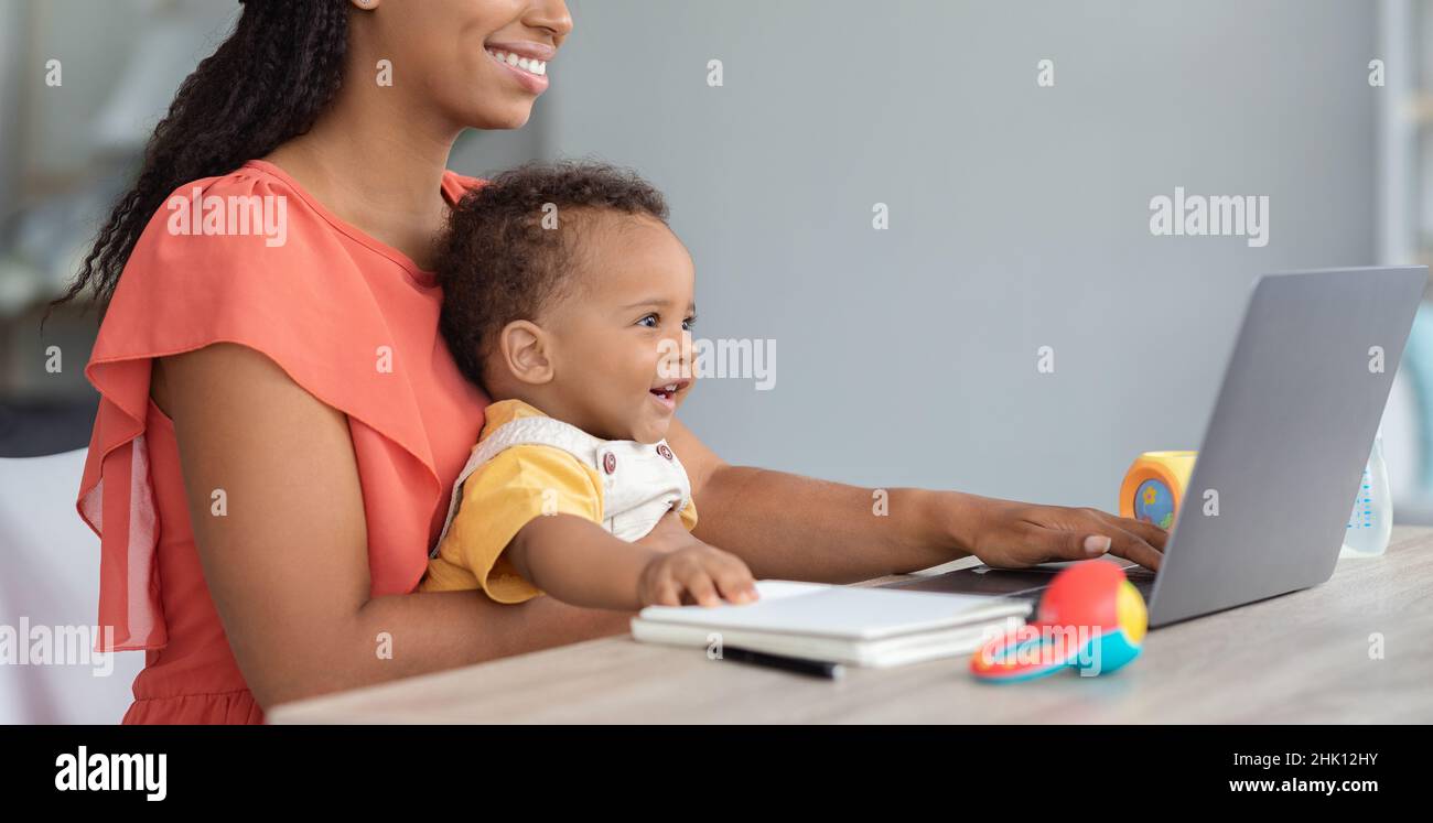 Kids And Technologies. Black Baby Boy Using Laptop With Mom At Home ...