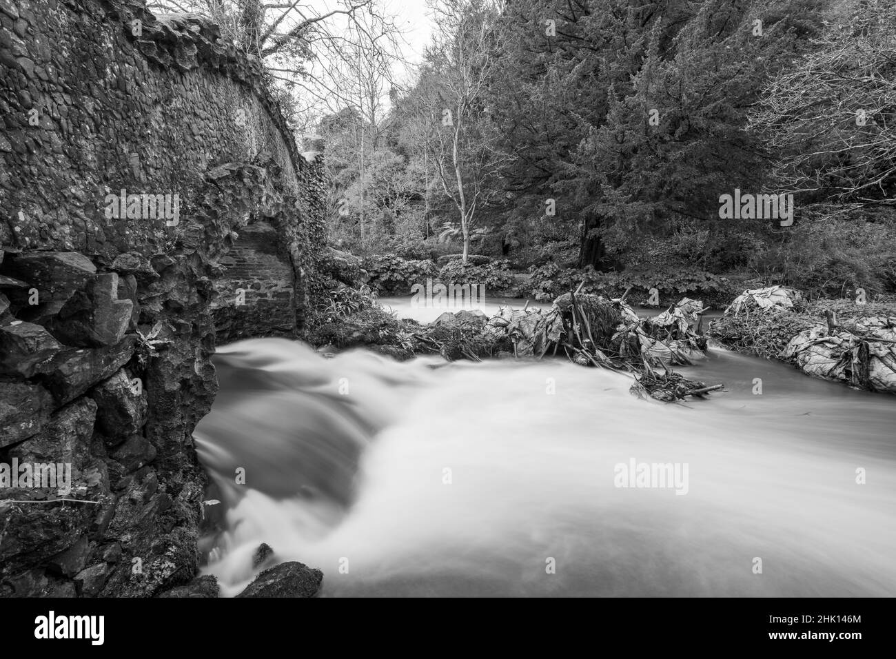Long exposure of the river Avill flowing under Lovers bridge in the ...