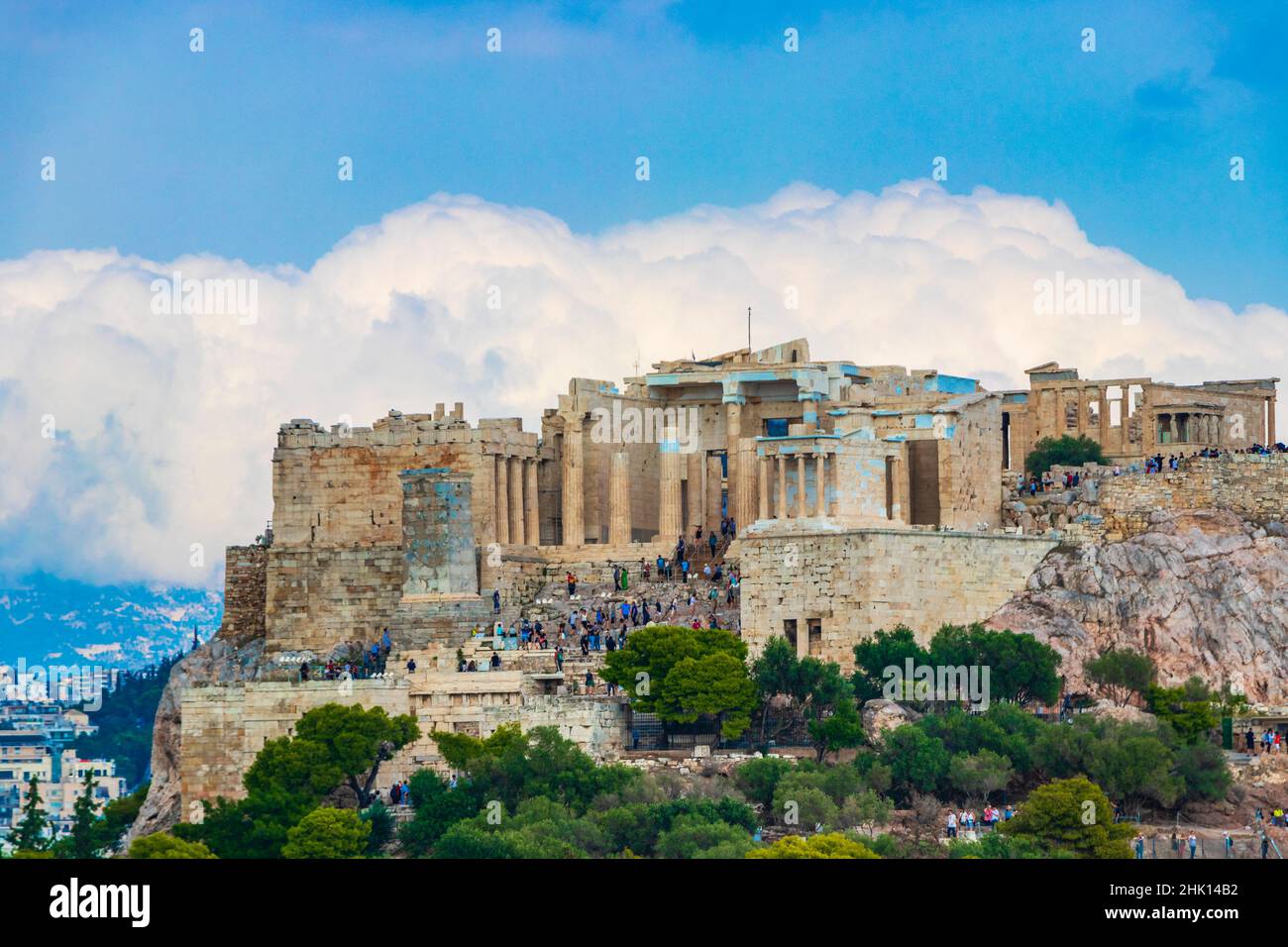 Acropolis of Athens on hill with amazing and beautiful ruins Parthenon and blue cloudy sky in ...