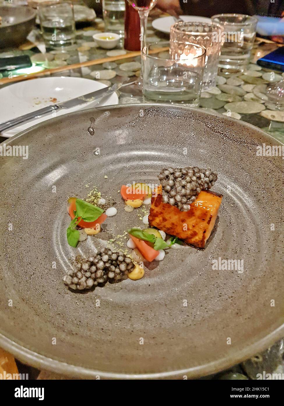 Plate of fine dining salmon in a restaurant Stock Photo - Alamy