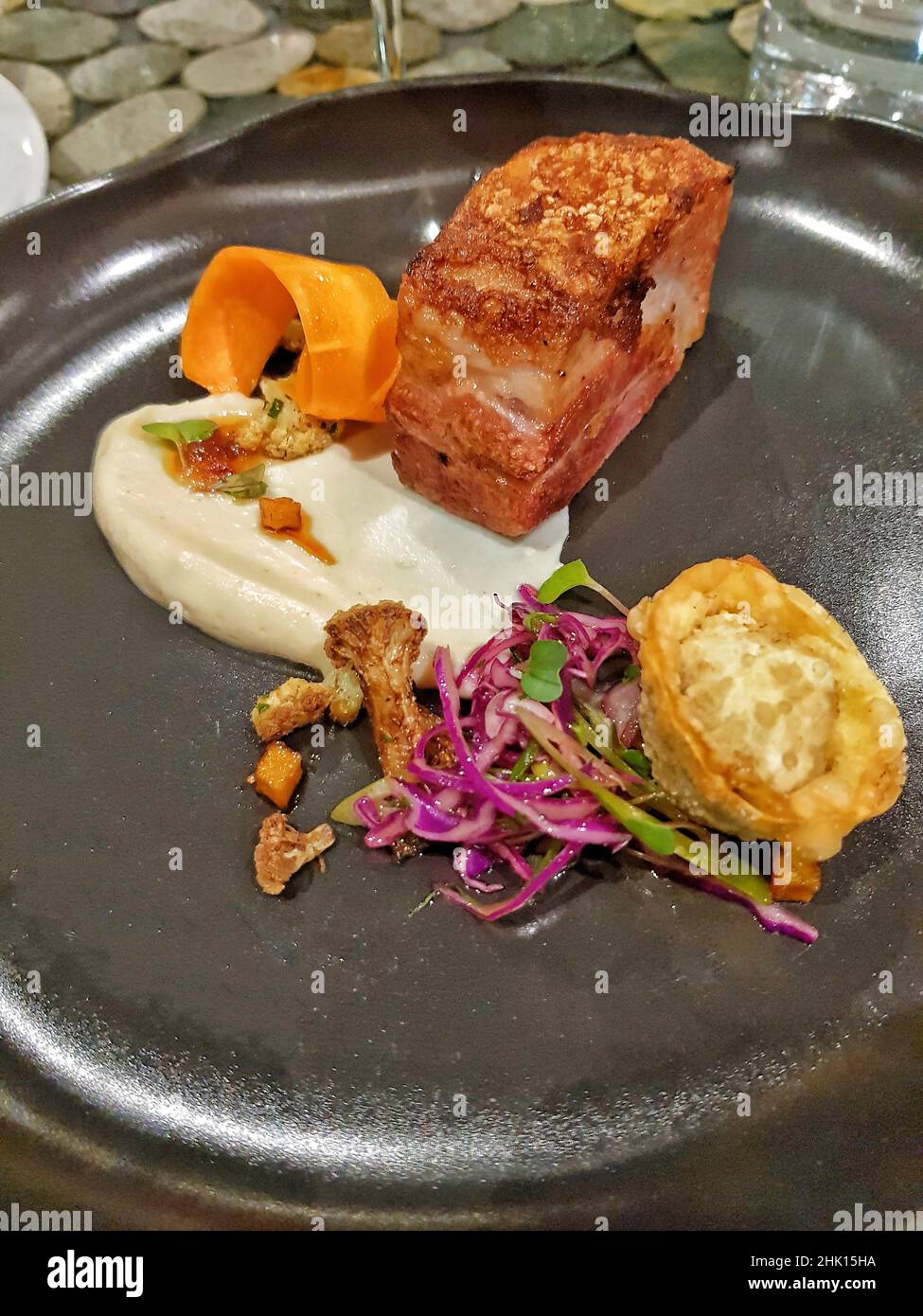 Plate with Fine Dining Pork belly Stock Photo - Alamy