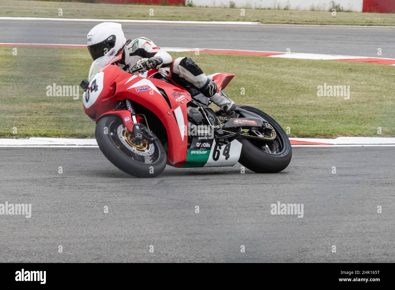 Track day motorcycle coming out of bend Stock Photo - Alamy