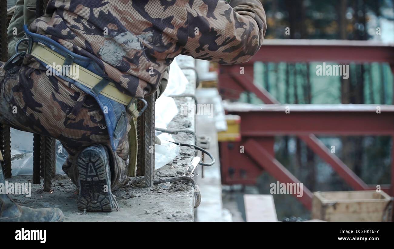 Construction worker working on a construction site. Clip. Employee ...