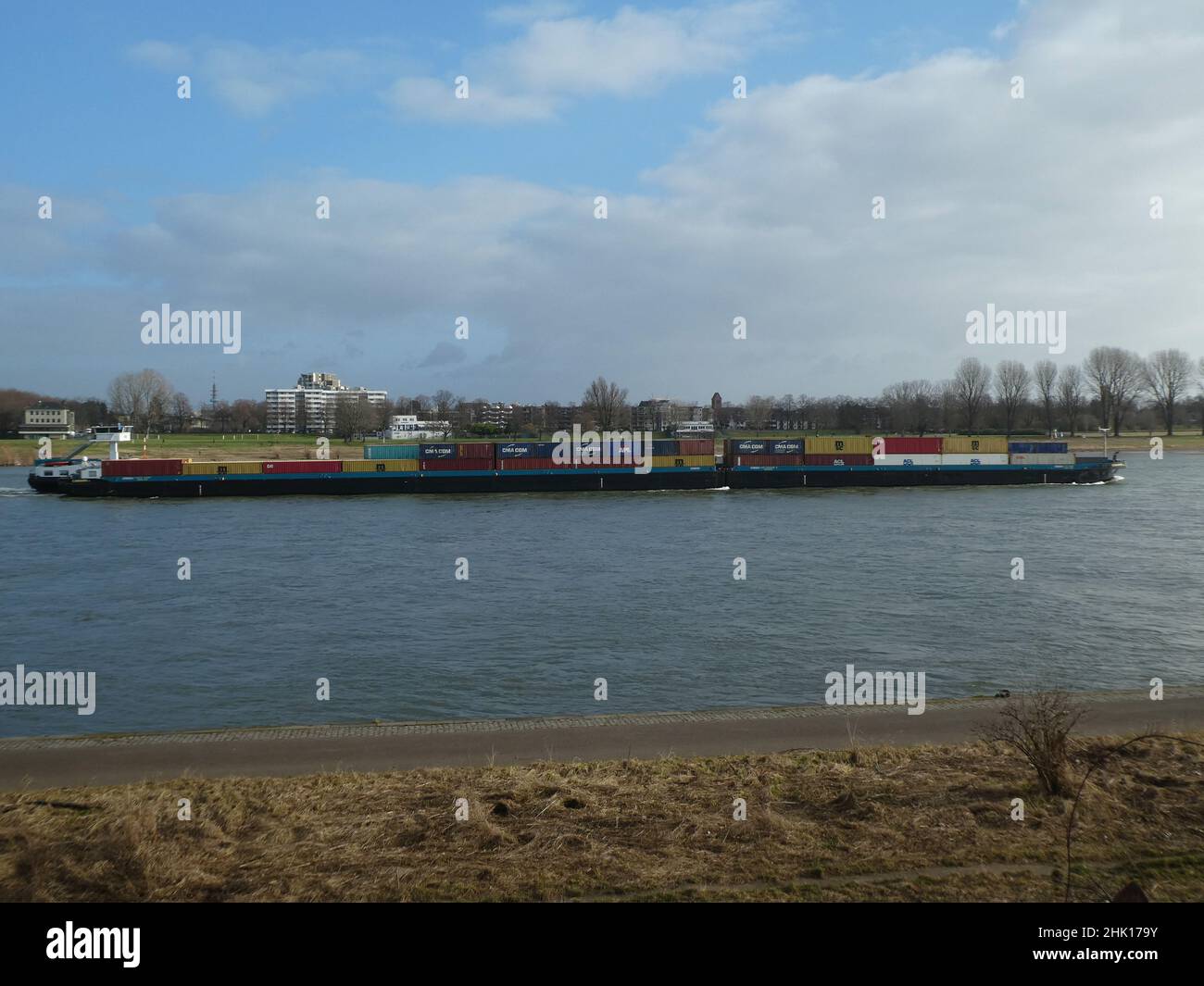Cologne, Germany. 23rd Jan, 2022. Freight tug, container ship compound ...