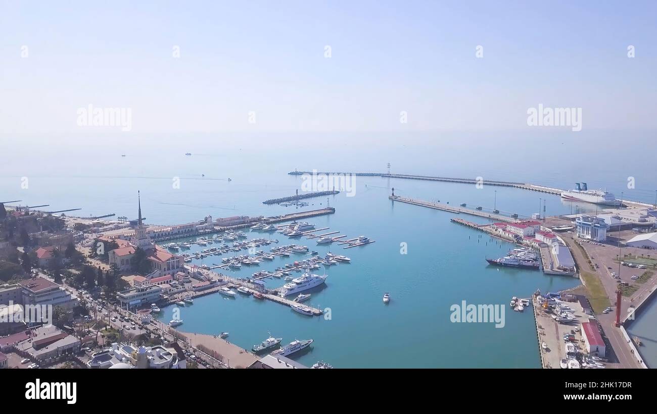 Top view of Bay with yachts near city. Clip. Sea port and Bay with ...