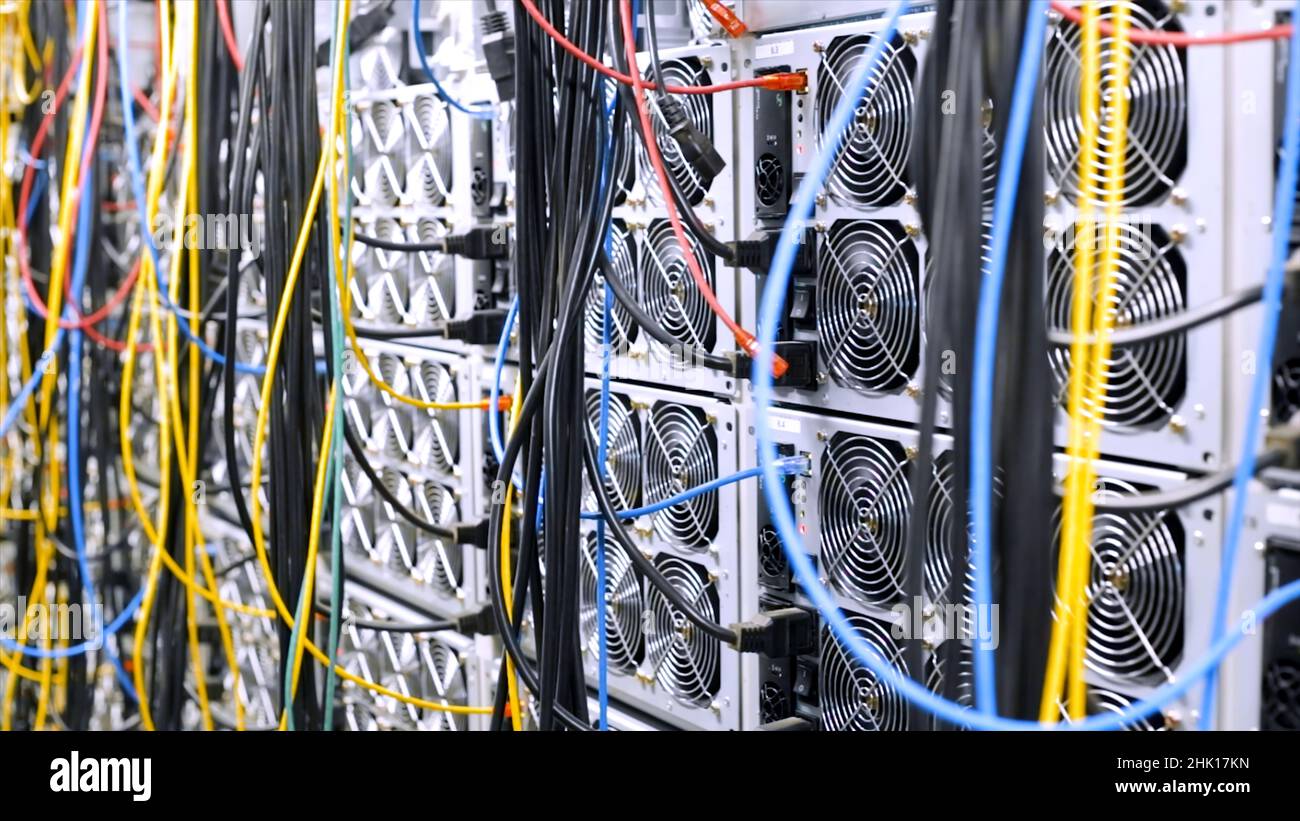 Wall of data centers and wires. Stock footage. Lots of units with data ...