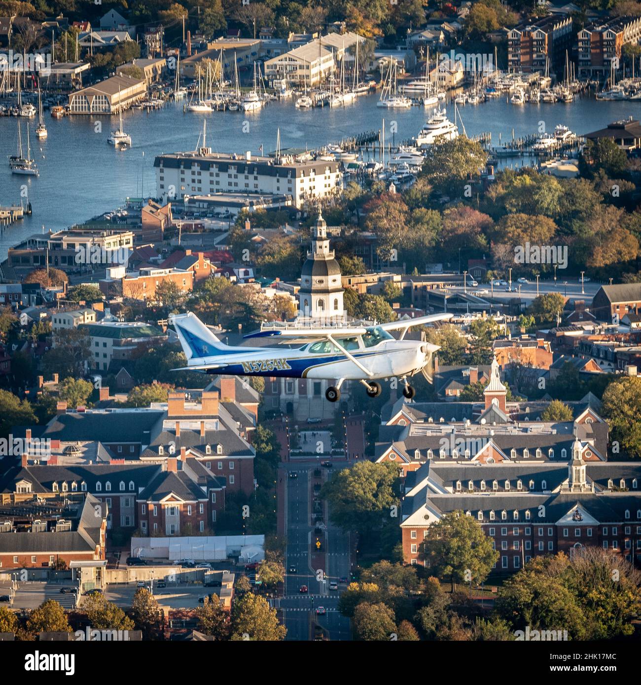A cessna 172 taking a sunset flight over Annapolis Stock Photo - Alamy
