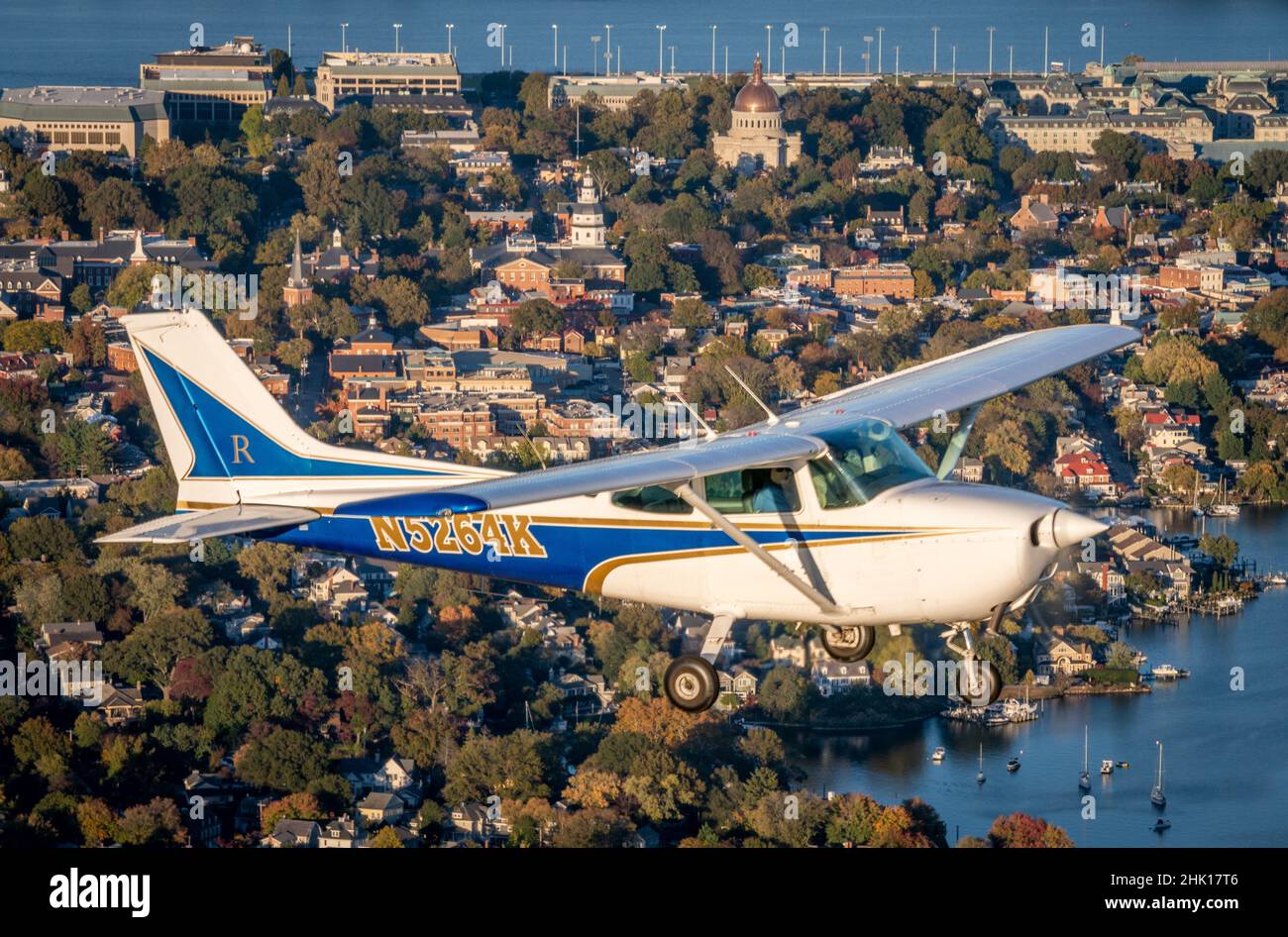 A cessna 172 taking a sunset flight over Annapolis Stock Photo - Alamy