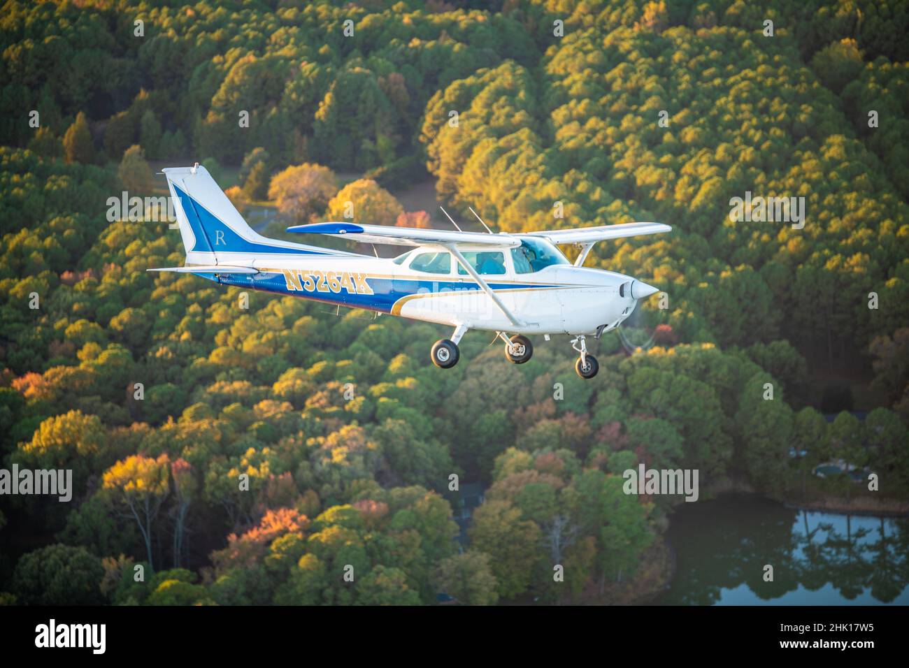 A cessna 172 taking a sunset flight over the Chesapeake Bay in Maryland ...