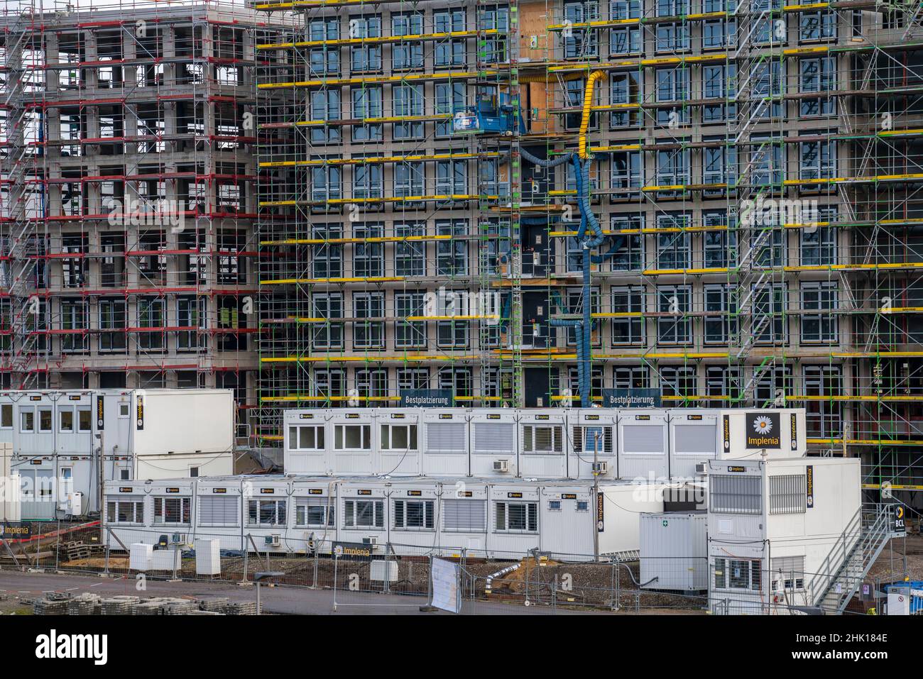 Large construction site, scaffolded shell of an office building complex ...